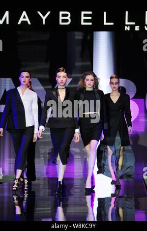Models display new creations at the Maybelline cosmetics show in ...
