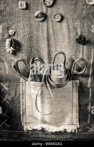 Closeup of sewing mat with scissors in vintage tailor mat Stock Photo ...