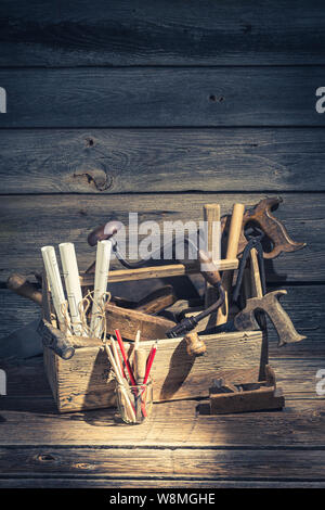 Carpenter tools on a rustic wooden background with space for text Stock ...