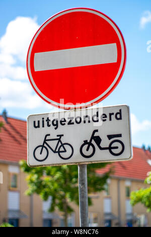 Dutch road sign: cyclists and moped riders Stock Photo - Alamy