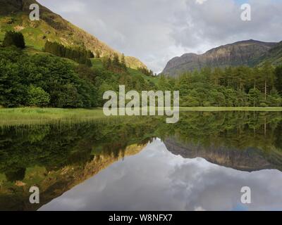 Evening Reflections on the Torren Lochan. The late evening summer ...