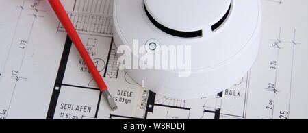 a smoke detector is on a floor plan Stock Photo - Alamy