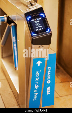 A OMNY Cubic Transportation Systems contactless tap-to-pay card reader ...