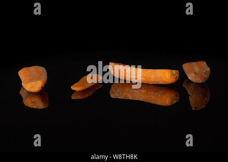 Group of four halves of stale orange stale baby carrot baby isolated on ...