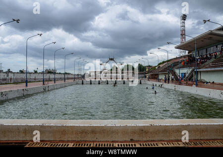 Outdoor swimming pool at the National Stadium, Freetown, Sierra Leone ...