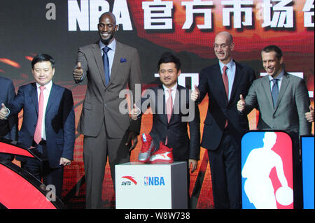 NBA commissioner Adam Silver, left, and Maggie Grise attend the Kering ...