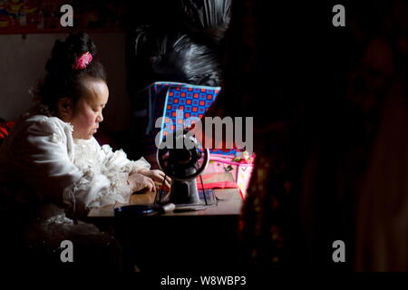 47-year-old Chinese villager Xiang Junfeng, dressed in a white wedding ...