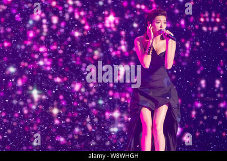 Taiwanese singer Puff Kuo performs during the "Daphne Extreme Live 2014 ...