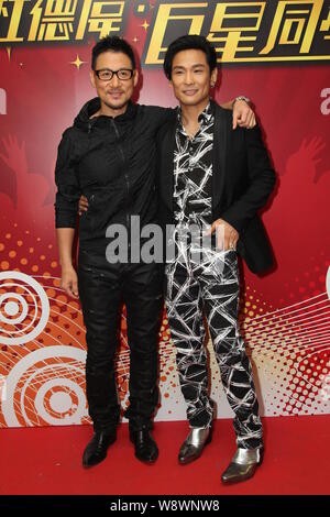 Hong Kong singers Jacky Cheung, left, and Alex To pose as they arrive ...