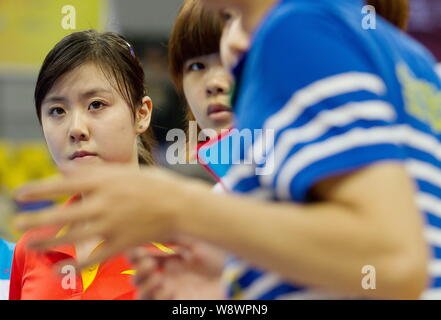 American table tennis player Ariel Hsing, back, and her mother Jiang ...