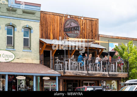 Gunnison, USA - June 20, 2019: Main street road in Colorado with sign ...