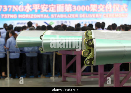 Horizontal stabilizers for the new Boeing 737 are lined up at the ...