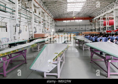 Horizontal stabilizers for the new Boeing 737 are lined up at the ...