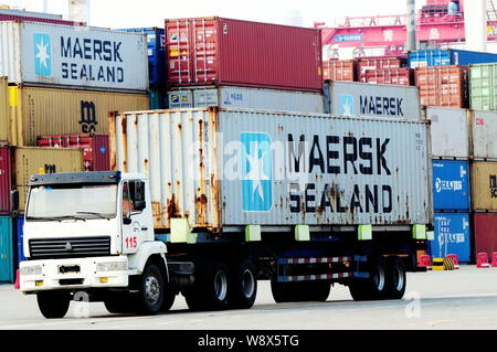 A container terminal at Qingdao Port in east China's Shandong Province ...