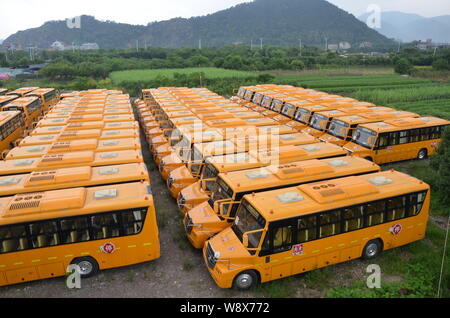 Chinese school bus parked in front of Chinese kindergarten in Shenzhen ...