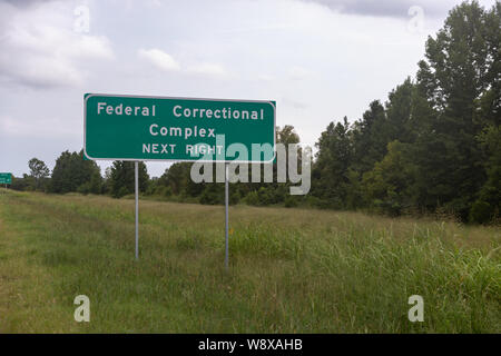 Federal Correctional Facility sign on the side of highway Stock Photo ...