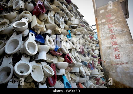 Toilet bowls, sinks and urinals are flushed on the toilet waterfall in ...