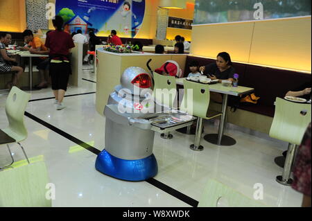 A robot-themed restaurant opens in Beijing, China, 9 August, 2025 ...