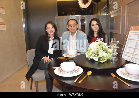 (From left) Hong Kong artist manager Paco Wong, singer and actress ...