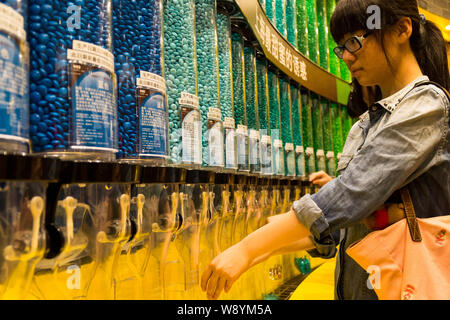 Customers buy chocolate candies at the flagship store of M&Ms in ...