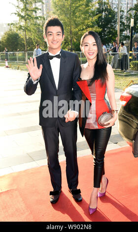 Chinese actress Huo Siyan, right, and her actor husband Du Jiang pose ...