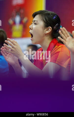 American table tennis player Ariel Hsing eats noodles in a restaurant ...