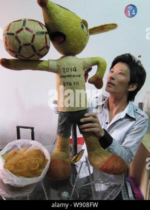 Chinese hairstylist Huang Xin puts final touches on his hair-made ...