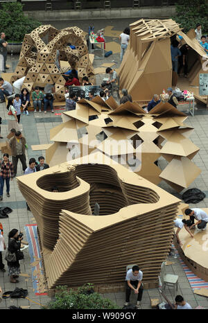 Chinese students build their paper house at the campus of Chongqing ...