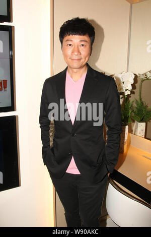 Hong Kong actor Wayne Lai and actress Shereen Tang pose for photos with ...