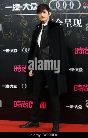 Chinese actor and singer Zhang Han or Hans Zhang arrives at an airport ...