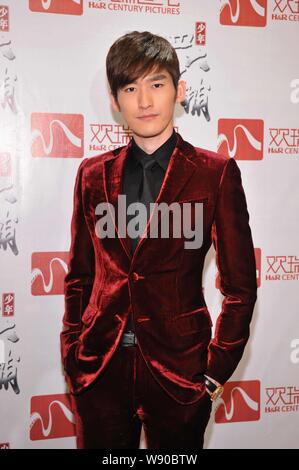 Chinese actor and singer Zhang Han or Hans Zhang arrives at an airport ...