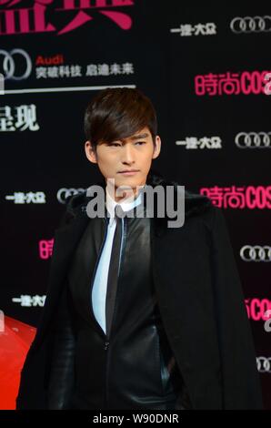 Chinese actor and singer Zhang Han or Hans Zhang arrives at an airport ...