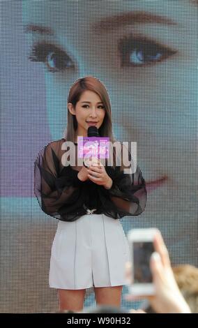 Taiwanese singer Elva Hsiao speaks during a press conference for her ...