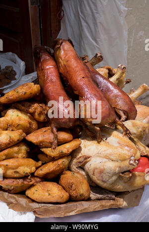 Traditional cuy roasted pig and chicharron food at the San Jacinto ...
