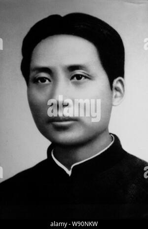 This picture shows a photos of Mao Zedong, left, founding father of ...