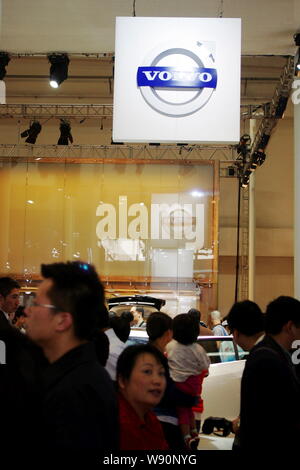 Visitors crowd the stand of Volvo during the 13th Beijing International ...