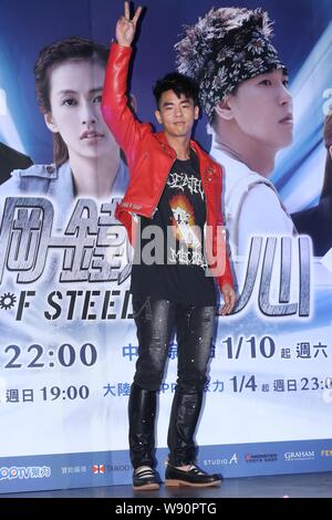 Taiwanese singer and actor Alan Ko attends a public benefit activity in ...