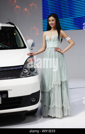 Chinese model Zhai Ling, also known as Shou Shou, poses at the stand of ...