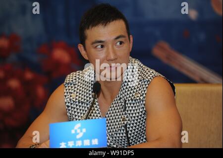 Taiwanese singer and actor Will Liu and his daughter Eve are pictured ...