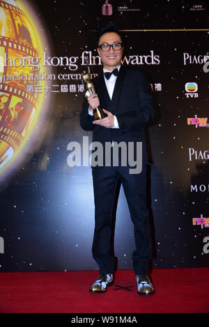 Hong Kong actor Ronald Cheng, left, and his wife Sammie Yu pose on the ...