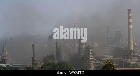 Black smoke rises as oil tanks are on fire after an explosion at a ...