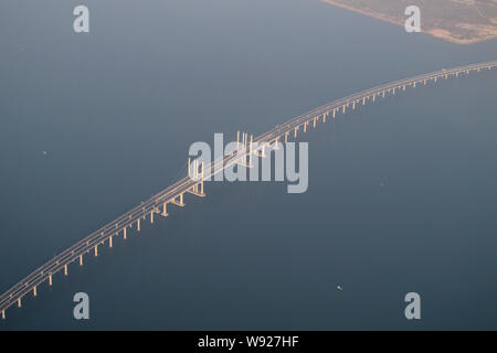 --FILE--Aerial view of the Jiaozhou Bay Bridge, also called the Qingdao ...