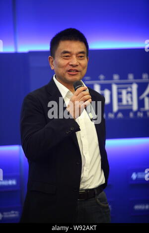 --FILE--Liu Yonghao, Chairman of New Hope Group, speaks at a meeting ...
