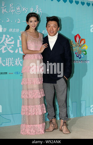 Taiwanese supermodel and actress Lin Chi-ling poses while she is lifted ...