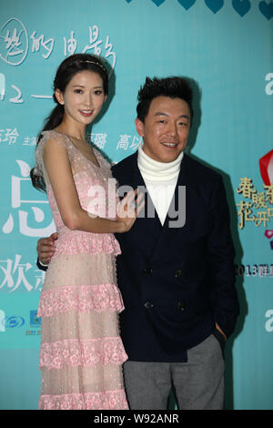 Taiwanese supermodel and actress Lin Chi-ling poses while she is lifted ...