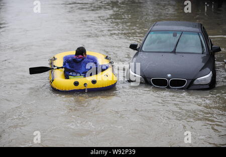 Man stranded on raft Stock Photo - Alamy