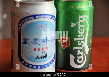 --FILE--Cans of Chongqing beer manufactured by Chongqing Brewery Co ...