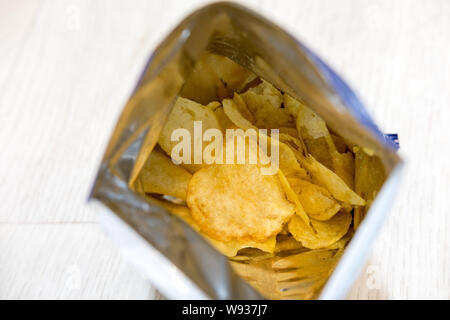 Potato crisps in package Stock Photo - Alamy