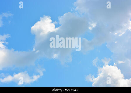 Colorful heavenly angelic white clouds and blue, blue sky with sunlight ...