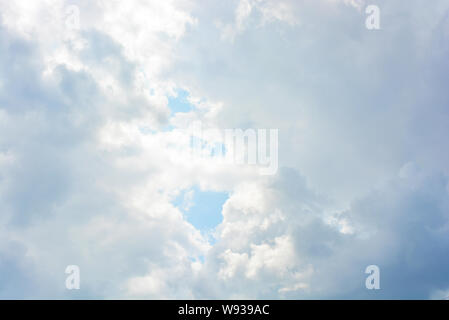 Colorful heavenly angelic white clouds and blue, blue sky with sunlight ...
